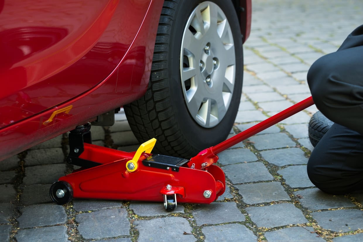 How to Use a Car Jack: A Beginner's Guide | DrivrZone.com